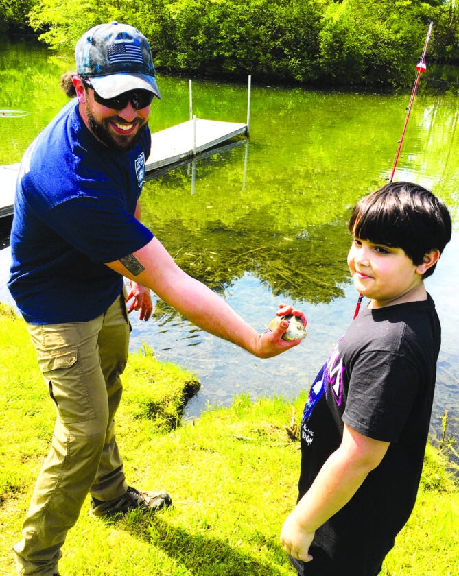 Cops and Bobbers: Youngstown police go fishing with Bunn students ...